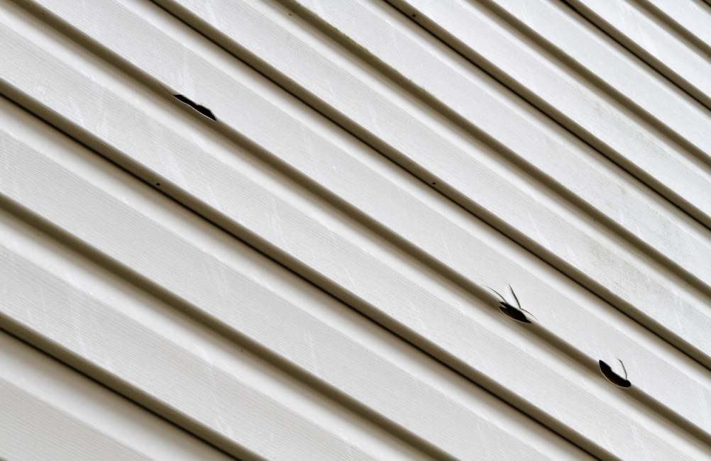 How Spring Storms Damage Siding - Window Makeover